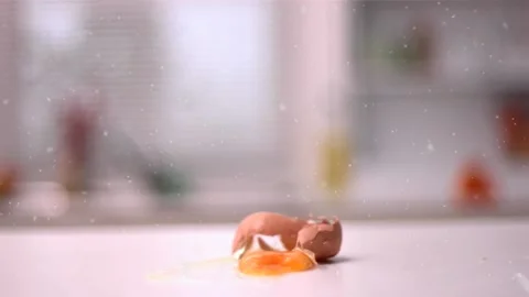 Animation of snow falling over egg crack... | Stock Video | Pond5