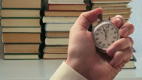 Animation of stacks of books and stopwat... | Stock Video | Pond5
