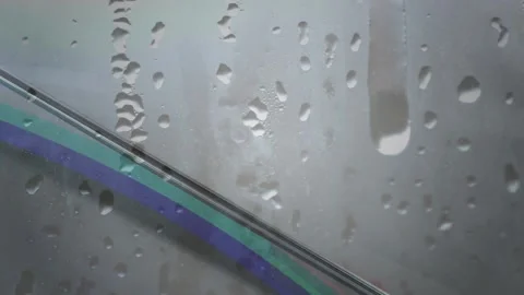 Animation of water drops falling over gl... | Stock Video | Pond5