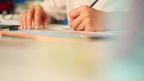 The animator artist draws in pencil a co... | Stock Video | Pond5