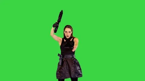 Anime girl poses with machine gun, takin... | Stock Video | Pond5