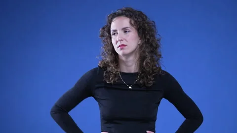 Annoyed woman rolling eyes in disgust an... | Stock Video | Pond5