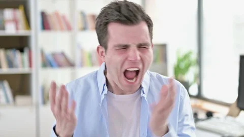 Annoyed Young Man Screaming and Shouting | Stock Video | Pond5