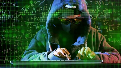 Anonymous computer hacker with mathemati... | Stock Video | Pond5
