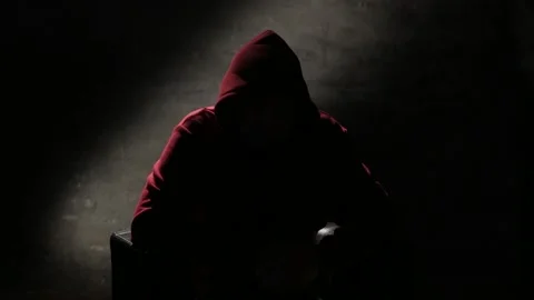 Anonymous man in a hood interview video ... | Stock Video | Pond5