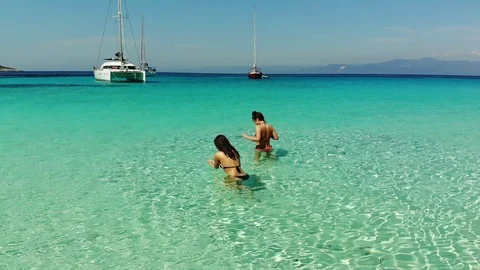 Girls Swimming Beach Stock Videos – Royalty-Free HD & 4K Videos | Pond5