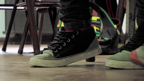 Anxious Student Tapping Feet Under Desk ... | Stock Video | Pond5