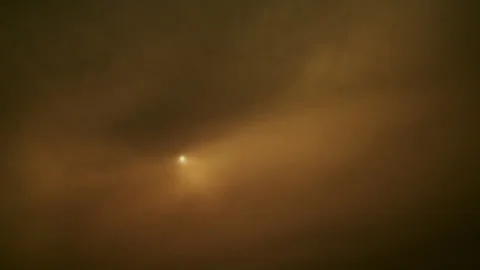 Apocalyptic vision of the sun peeking in... | Stock Video | Pond5