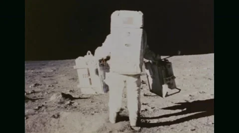 Apollo 11 astronaut walking on moon's surface ~ FREE Video ~ #44608772