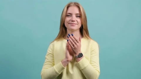 Applauding young pretty girl, clapping o... | Stock Video | Pond5