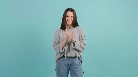 Applauding young pretty girl, clapping o... | Stock Video | Pond5