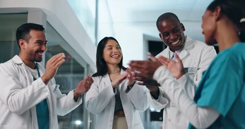 Applause, nurses and doctors in celebrat... | Stock Video | Pond5