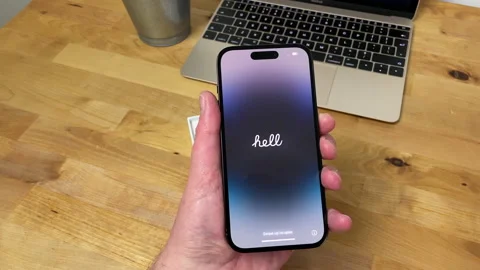 Apple iPhone 14 Pro booting for the firs... | Stock Video | Pond5