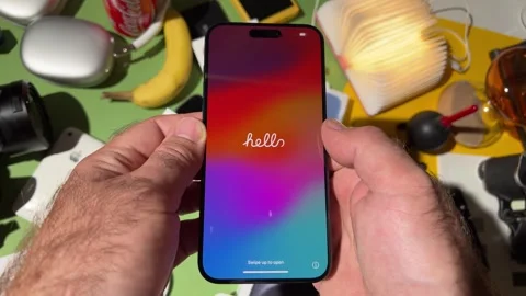 Apple Logo and Welcome Messages on First... | Stock Video | Pond5