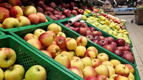 Apples in plastic boxes in a store, clos... | Stock Video | Pond5