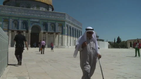 Arab Man With Cane Walks By With Beautif... | Stock Video | Pond5