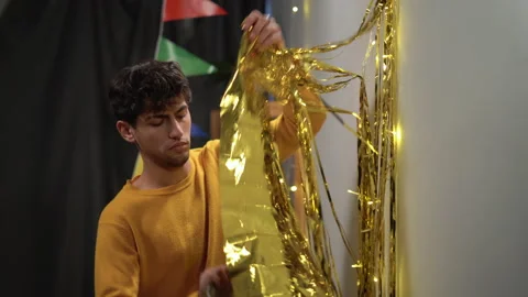 Arab man cleaning after party at home re... | Stock Video | Pond5