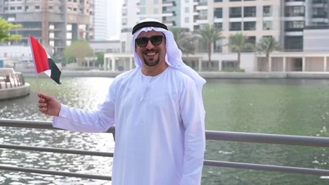 Arab Man holding UAE flag | Stock Video | Pond5
