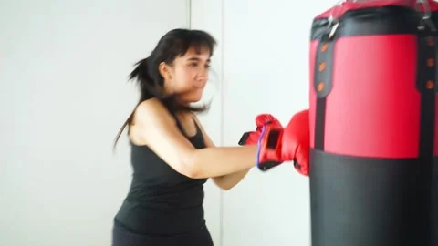 Arabian woman doing exercise by a boxing... | Stock Video | Pond5