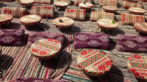 Arabic coffee with sitting on the ground... | Stock Video | Pond5