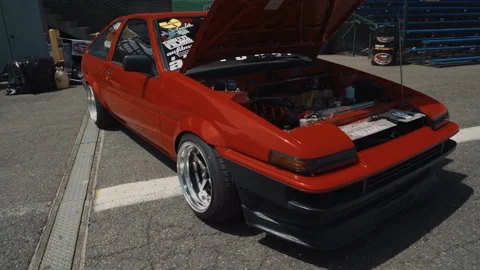 Arc Shot of a Cool Red Toyota AE86 Hatch... | Stock Video | Pond5