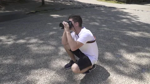 Arc Shot of a Man Taking Photos of Kyoto... | Stock Video | Pond5
