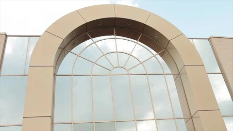 arch arc windows on beige mall storefron... | Stock Video | Pond5