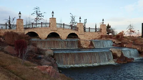 Arch Bridge With Water Feature Flowing B... | Stock Video | Pond5