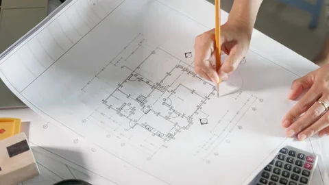 Architect open drawing paper to review a... | Stock Video | Pond5