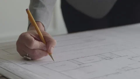 Architect Writing Notes on Her Design at... | Stock Video | Pond5