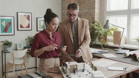 Architects Taking Photo Of 3D Layout Of ... | Stock Video | Pond5