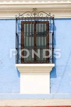 Architectural detail of colonial house in La Antigua Guatemala, window ...