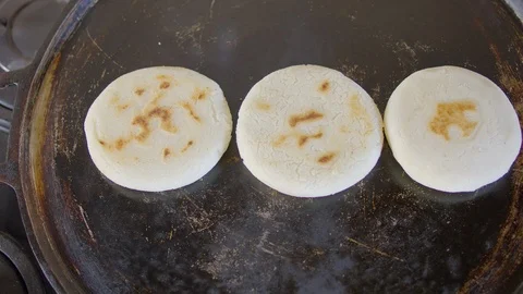 Arepas, Venezuelan dish made of corn flo... | Stock Video | Pond5