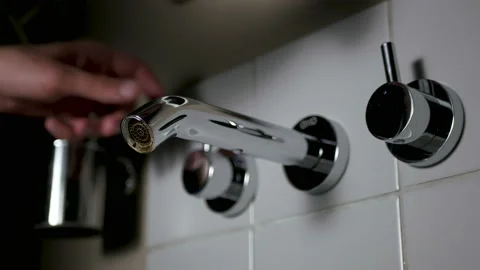 arm includes a water tap built into the ... | Stock Video | Pond5