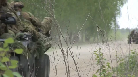 Armed US Marine Corps head together to t... | Stock Video | Pond5