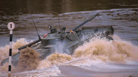 Armored military BMP cross the river in ... | Stock Video | Pond5