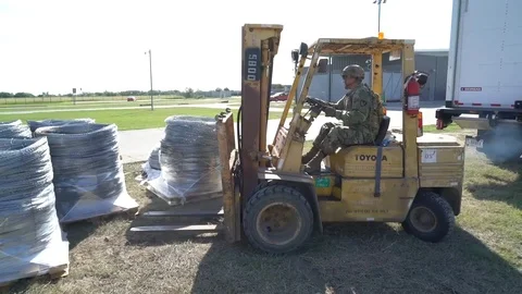 Army engineers load concertina wire for ... | Stock Video | Pond5