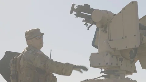 An army gunman mans a Humvee mounted mac... | Stock Video | Pond5