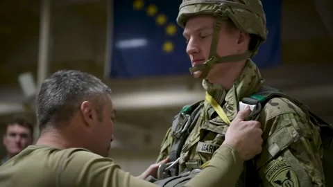 Army jumpmaster carries out safety check... | Stock Video | Pond5