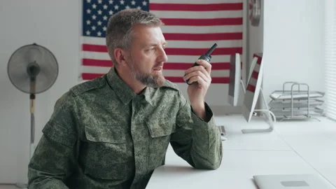 Army Officer in Uniform Talking on Walki... | Stock Video | Pond5