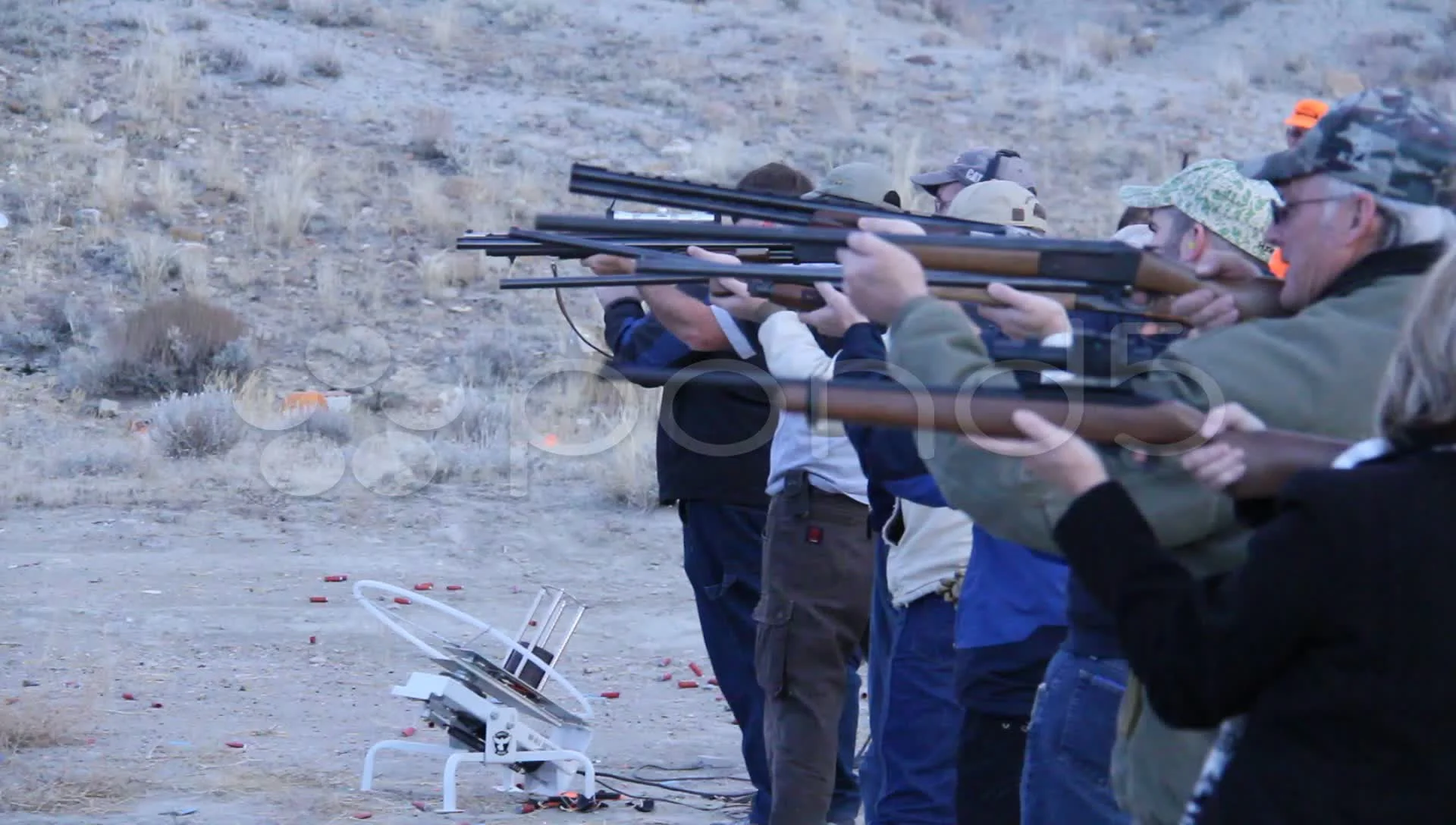 People Shooting Guns