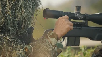 Army sniper loading his rifle. | Stock Video | Pond5