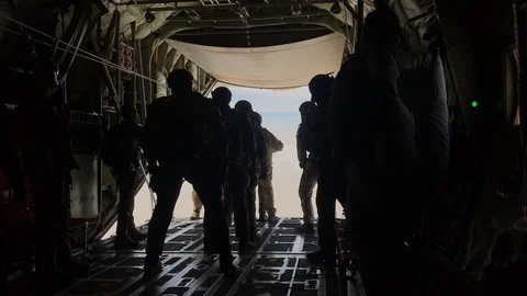 Army soldiers conduct a static line jump... | Stock Video | Pond5