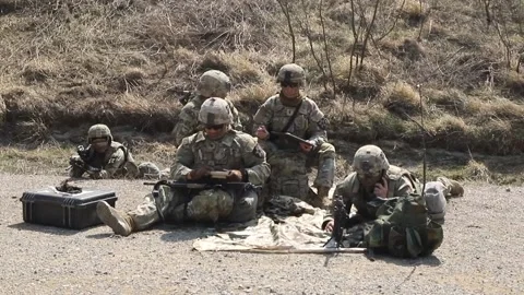 Army soldiers with notepads and radio du... | Stock Video | Pond5