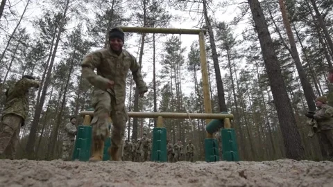 Army soldiers use rope to help in cleari... | Stock Video | Pond5