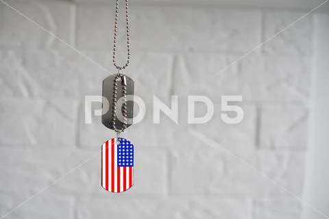 Army tokens on American national flag background Stock Image #152727656