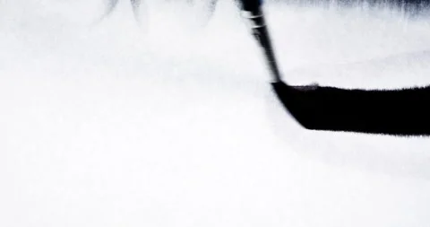 Artist drawing black line with paint bru... | Stock Video | Pond5