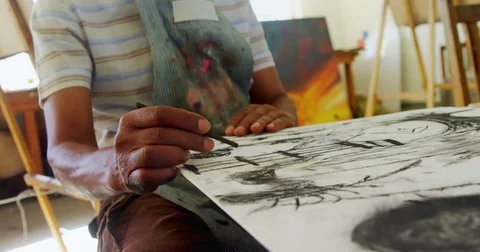 Artist drawing sketch at table 4k | Stock Video | Pond5