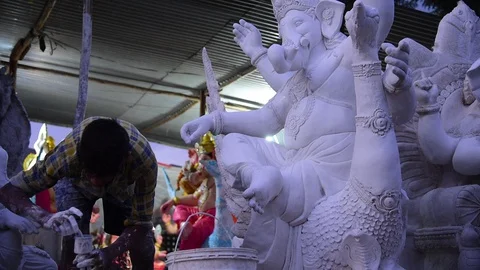 Artist making a statue of the Hindu god ... | Stock Video | Pond5
