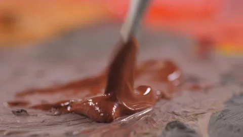 artist painter mixing brown oil paint wi... | Stock Video | Pond5